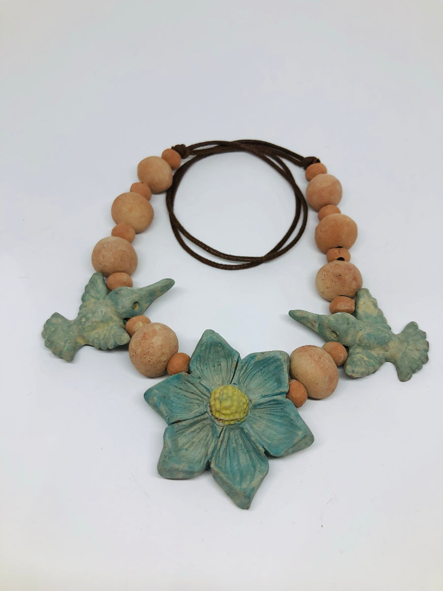 Colibri azul con flor – Coatlicue Arte- Xolito Mio